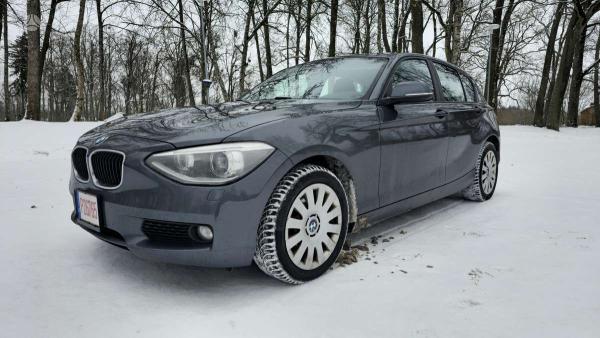 Grey BMW 118 2013 in Alytus, with an engine capacity of 2.00 L and mileage of 293 thousand km for 7250 €, photo 2 on AUTOMOTO.COM.LV