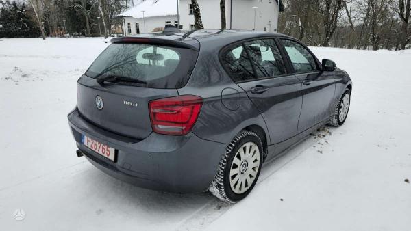 Grey BMW 118 2013 in Alytus, with an engine capacity of 2.00 L and mileage of 293 thousand km for 7250 €, photo 8 on AUTOMOTO.COM.LV