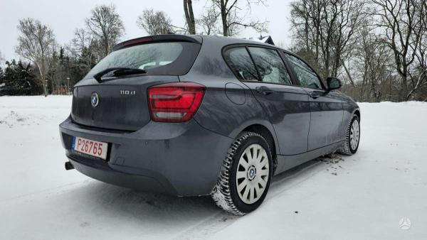 Grey BMW 118 2013 in Alytus, with an engine capacity of 2.00 L and mileage of 293 thousand km for 7250 €, photo 9 on AUTOMOTO.COM.LV