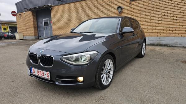 Grey BMW 118 2014 in Riga, with an engine capacity of 2.00 L and mileage of 187 thousand km for 9950 €, photo 1 on AUTOMOTO.COM.LV