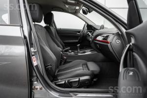 Grey BMW 118 2015 in Riga, with an engine capacity of 1.60 L and mileage of 169 thousand km for 8450 €, photo 12 on AUTOMOTO.COM.LV
