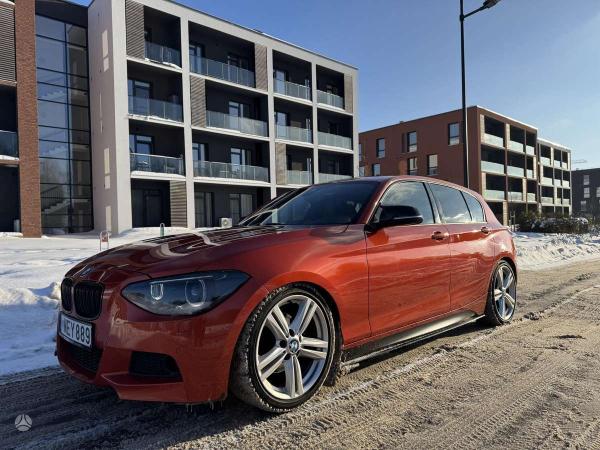 Orange BMW 118 2012 in Vilnius, with an engine capacity of 1.60 L and mileage of 205 thousand km for 9550 €, photo 1 on AUTOMOTO.COM.LV