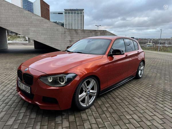 Orange BMW 118 2013 in Vilnius, with an engine capacity of 1.60 L and mileage of 204 thousand km for 9600 €, photo 1 on AUTOMOTO.COM.LV