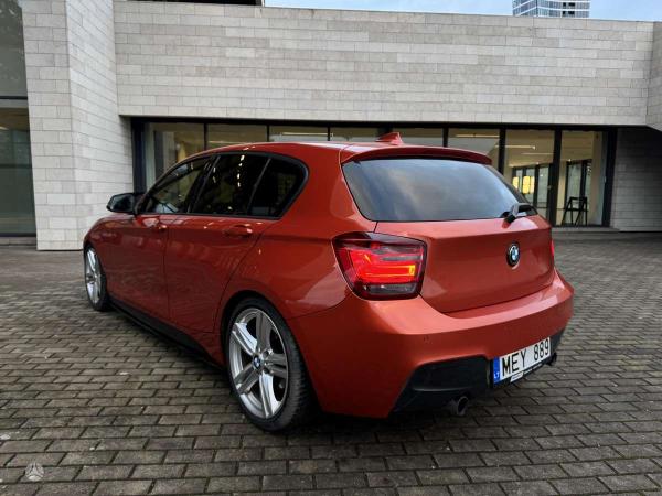 Orange BMW 118 2013 in Vilnius, with an engine capacity of 1.60 L and mileage of 204 thousand km for 9600 €, photo 3 on AUTOMOTO.COM.LV