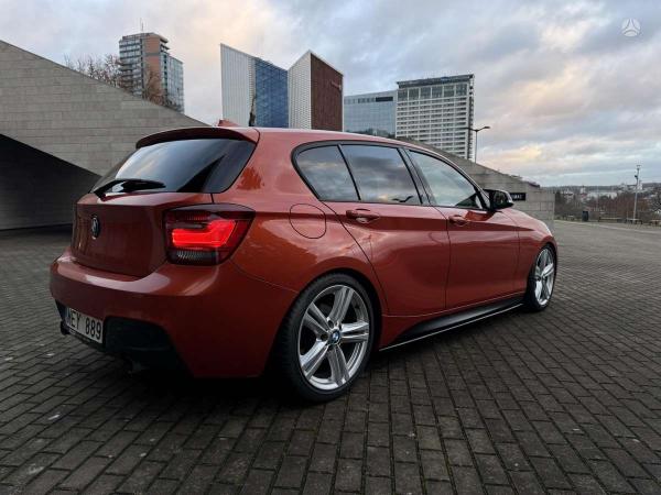 Orange BMW 118 2013 in Vilnius, with an engine capacity of 1.60 L and mileage of 204 thousand km for 9600 €, photo 4 on AUTOMOTO.COM.LV