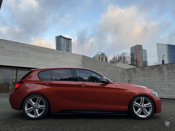 Orange BMW 118 2013 in Vilnius, with an engine capacity of 1.60 L and mileage of 204 thousand km for 9600 €, photo 6 on AUTOMOTO.COM.LV