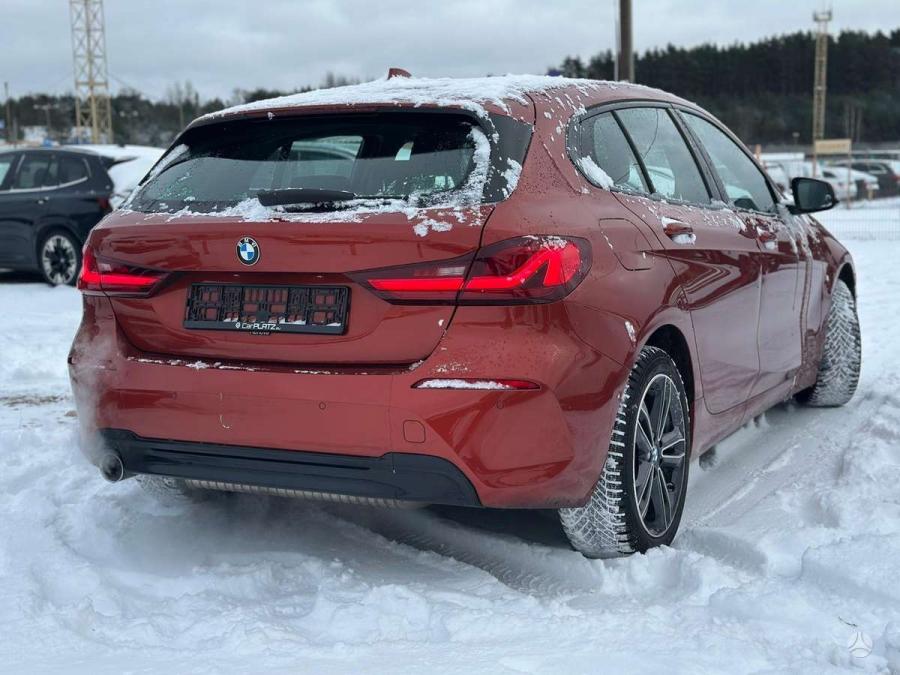 Orange BMW 118 2021 in Vilnius, with an engine capacity of 1.50 L and mileage of 158 thousand km for 16900 €, photo 6 on AUTOMOTO.COM.LV