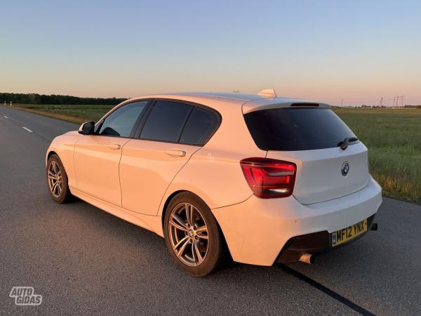 White BMW 118 2012 in Ariogala, with an engine capacity of 2.00 L and mileage of 265 thousand km for 2650 €, photo 3 on AUTOMOTO.COM.LV