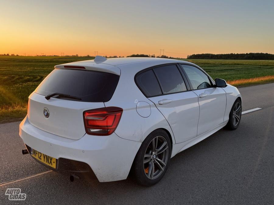 White BMW 118 2012 in Ariogala, with an engine capacity of 2.00 L and mileage of 265 thousand km for 2650 €, photo 5 on AUTOMOTO.COM.LV