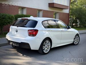 White BMW 118 2012 in Jelgava, with an engine capacity of 2.00 L and mileage of 292 thousand km for 8700 €, photo 8 on AUTOMOTO.COM.LV
