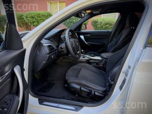 White BMW 118 2012 in Jelgava, with an engine capacity of 2.00 L and mileage of 292 thousand km for 8700 €, photo 10 on AUTOMOTO.COM.LV