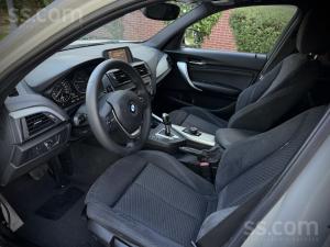 White BMW 118 2012 in Jelgava, with an engine capacity of 2.00 L and mileage of 292 thousand km for 8700 €, photo 13 on AUTOMOTO.COM.LV