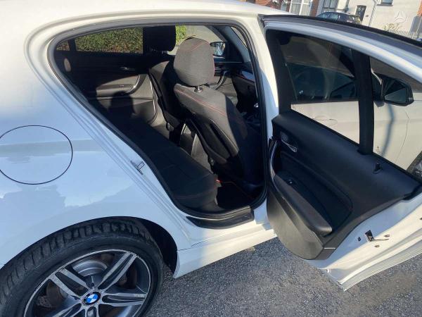 White BMW 118 2013 in Joniskis, with an engine capacity of 2.00 L and mileage of 118 thousand km for 2300 €, photo 9 on AUTOMOTO.COM.LV