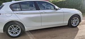 White BMW 118 2014 in Rokiskis, with an engine capacity of 2.00 L and mileage of 143 thousand km for 6399 €, photo 6 on AUTOMOTO.COM.LV