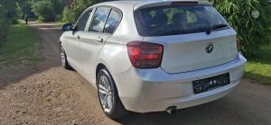 White BMW 118 2014 in Rokiskis, with an engine capacity of 2.00 L and mileage of 143 thousand km for 6399 €, photo 9 on AUTOMOTO.COM.LV