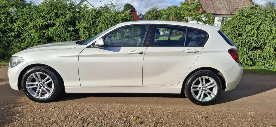 White BMW 118 2014 in Rokiskis, with an engine capacity of 2.00 L and mileage of 143 thousand km for 6399 €, photo 10 on AUTOMOTO.COM.LV