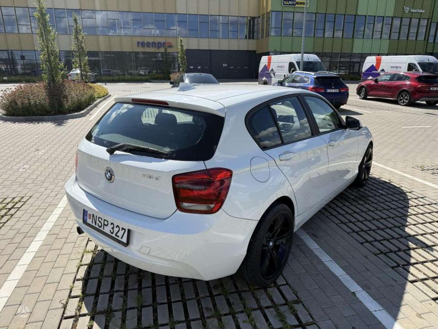 White BMW 118 2014 in Vilnius, with an engine capacity of 2.00 L and mileage of 230 thousand km for 7500 €, photo 6 on AUTOMOTO.COM.LV