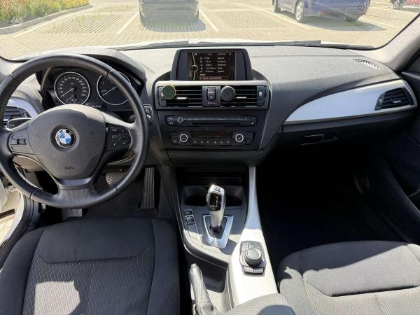 White BMW 118 2014 in Vilnius, with an engine capacity of 2.00 L and mileage of 230 thousand km for 7500 €, photo 8 on AUTOMOTO.COM.LV