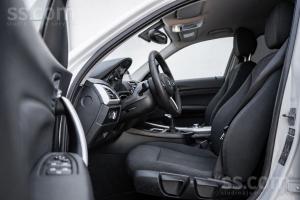 White BMW 118 2014 in Riga, with an engine capacity of 2.00 L and mileage of 202 thousand km for 5990 €, photo 8 on AUTOMOTO.COM.LV