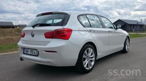 White BMW 118 2015 in Riga, with an engine capacity of 2.00 L and mileage of 230 thousand km for 8999 €, photo 5 on AUTOMOTO.COM.LV