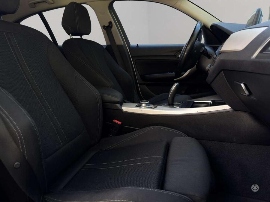 White BMW 118 2018 in Klaipeda, with an engine capacity of 1.50 L and mileage of 252 thousand km for 10499 €, photo 9 on AUTOMOTO.COM.LV