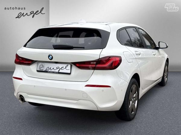 White BMW 118 2023 in Kaunas, with an engine capacity of 1.50 L and mileage of 77 thousand km for 22780 €, photo 5 on AUTOMOTO.COM.LV