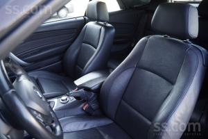 Black BMW 120 2009 in Riga, with an engine capacity of 2.00 L and mileage of 224 thousand km for 7250 €, photo 31 on AUTOMOTO.COM.LV