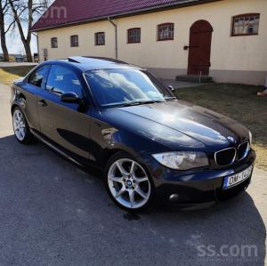 Black BMW 120 2009 in Ogre, with an engine capacity of 2.00 L and mileage of 196 thousand km for 5995 €, photo  on AUTOMOTO.COM.LV