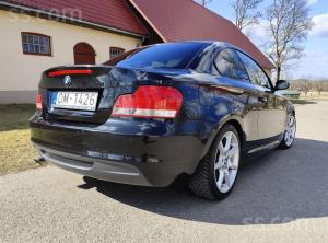Black BMW 120 2009 in Ogre, with an engine capacity of 2.00 L and mileage of 196 thousand km for 5995 €, photo 3 on AUTOMOTO.COM.LV