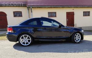 Black BMW 120 2009 in Ogre, with an engine capacity of 2.00 L and mileage of 196 thousand km for 5995 €, photo 4 on AUTOMOTO.COM.LV