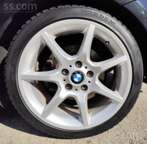 Black BMW 120 2009 in Ogre, with an engine capacity of 2.00 L and mileage of 196 thousand km for 5995 €, photo 5 on AUTOMOTO.COM.LV