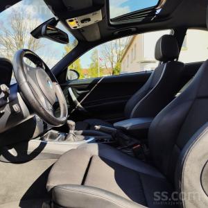 Black BMW 120 2009 in Ogre, with an engine capacity of 2.00 L and mileage of 196 thousand km for 5995 €, photo 6 on AUTOMOTO.COM.LV
