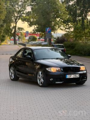 Black BMW 120 2009 in Riga, with an engine capacity of 2.00 L and mileage of 283 thousand km for 6490 €, photo  on AUTOMOTO.COM.LV