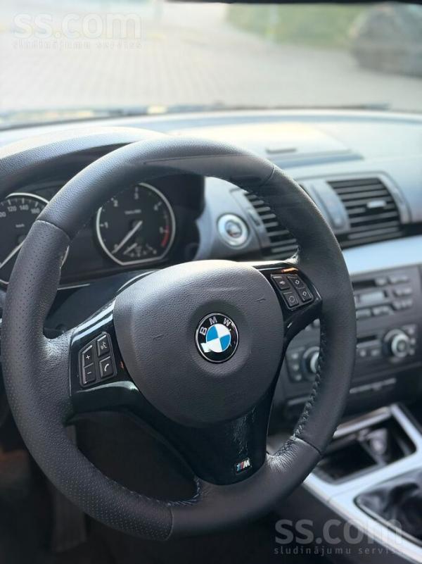 Black BMW 120 2009 in Riga, with an engine capacity of 2.00 L and mileage of 283 thousand km for 6490 €, photo 6 on AUTOMOTO.COM.LV