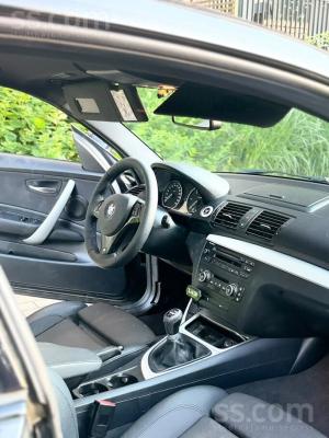 Black BMW 120 2009 in Riga, with an engine capacity of 2.00 L and mileage of 283 thousand km for 6490 €, photo 8 on AUTOMOTO.COM.LV
