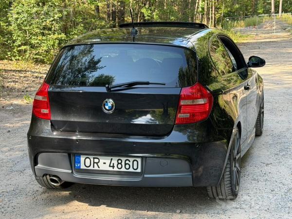 Black BMW 120 2009 in Riga, with an engine capacity of 2.00 L and mileage of 254 thousand km for 5350 €, photo 7 on AUTOMOTO.COM.LV