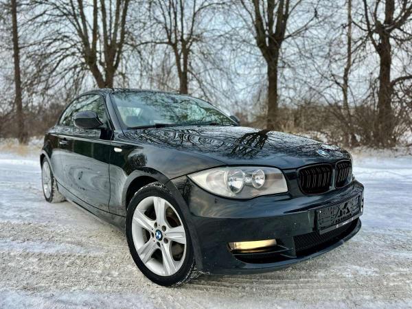 Black BMW 120 2011 in Siauliai, with an engine capacity of 2.00 L and mileage of 248 thousand km for 5650 €, photo 1 on AUTOMOTO.COM.LV