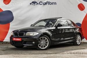 Black BMW 120 2013 in Riga, with an engine capacity of 2.00 L and mileage of 285 thousand km for 8790 €, photo  on AUTOMOTO.COM.LV