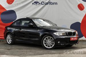 Black BMW 120 2013 in Riga, with an engine capacity of 2.00 L and mileage of 285 thousand km for 8790 €, photo 4 on AUTOMOTO.COM.LV