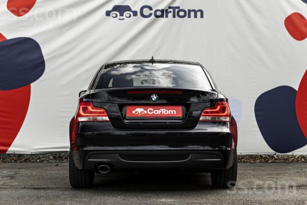 Black BMW 120 2013 in Riga, with an engine capacity of 2.00 L and mileage of 285 thousand km for 8790 €, photo 5 on AUTOMOTO.COM.LV