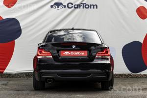 Black BMW 120 2013 in Riga, with an engine capacity of 2.00 L and mileage of 285 thousand km for 8790 €, photo 6 on AUTOMOTO.COM.LV