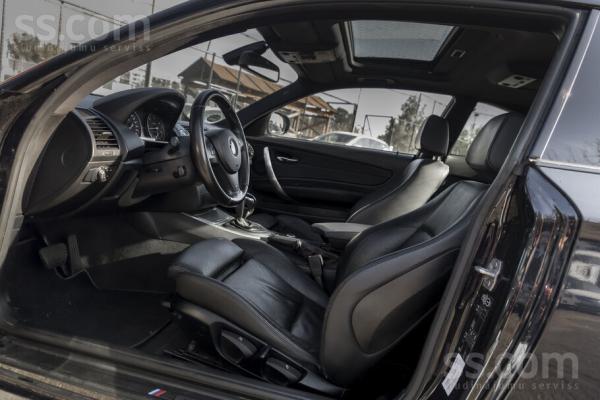 Black BMW 120 2013 in Riga, with an engine capacity of 2.00 L and mileage of 285 thousand km for 8790 €, photo 7 on AUTOMOTO.COM.LV