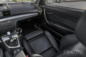 Black BMW 120 2013 in Riga, with an engine capacity of 2.00 L and mileage of 285 thousand km for 8790 €, photo 11 on AUTOMOTO.COM.LV