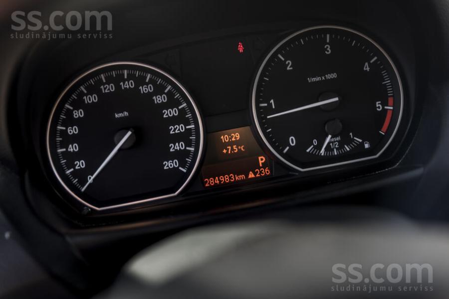 Black BMW 120 2013 in Riga, with an engine capacity of 2.00 L and mileage of 285 thousand km for 8790 €, photo 15 on AUTOMOTO.COM.LV