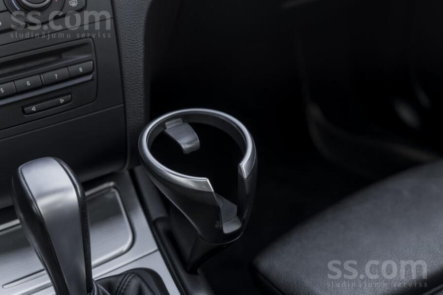 Black BMW 120 2013 in Riga, with an engine capacity of 2.00 L and mileage of 0 thousand km for 8790 €, photo 15 on AUTOMOTO.COM.LV