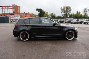 Black BMW 120 2006 in Riga, with an engine capacity of 2.00 L and mileage of 332 thousand km for 4990 €, photo 7 on AUTOMOTO.COM.LV