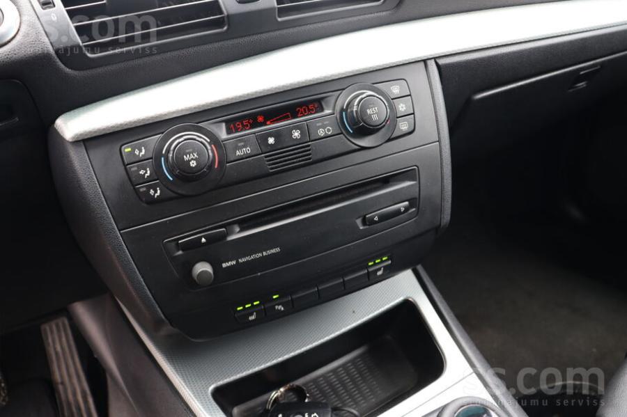 Black BMW 120 2006 in Riga, with an engine capacity of 2.00 L and mileage of 332 thousand km for 4990 €, photo 14 on AUTOMOTO.COM.LV