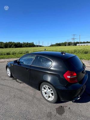 Black BMW 120 2007 in Panevezys, with an engine capacity of 2.00 L and mileage of 320 thousand km for 1950 €, photo  on AUTOMOTO.COM.LV