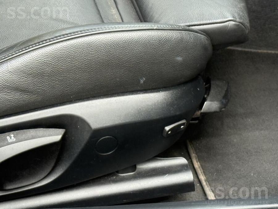 Black BMW 120 2007 in Ogre, with an engine capacity of 2.00 L and mileage of 235 thousand km for 2950 €, photo 12 on AUTOMOTO.COM.LV