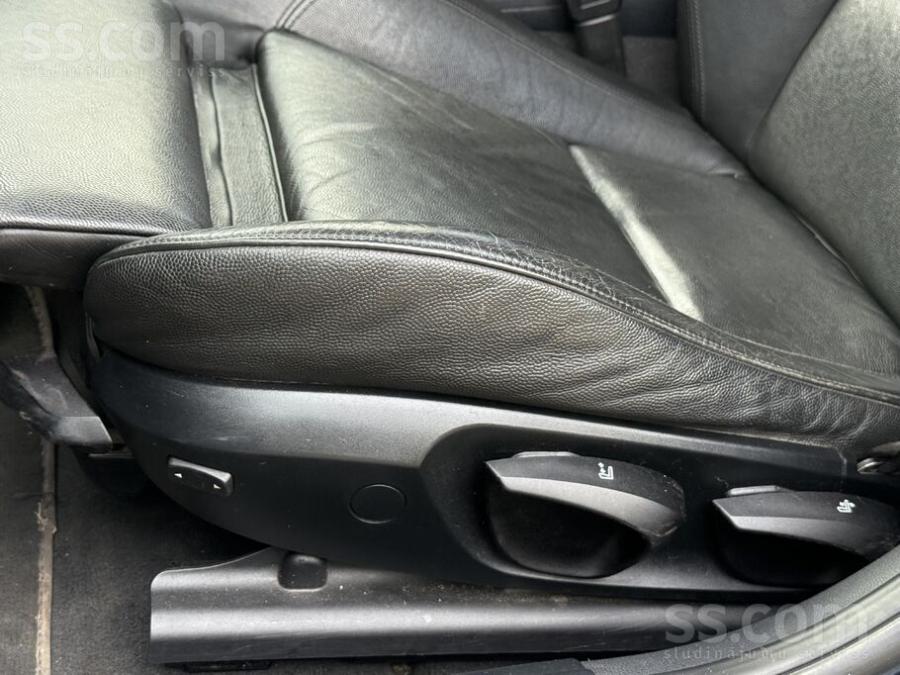 Black BMW 120 2007 in Ogre, with an engine capacity of 2.00 L and mileage of 235 thousand km for 2950 €, photo 14 on AUTOMOTO.COM.LV